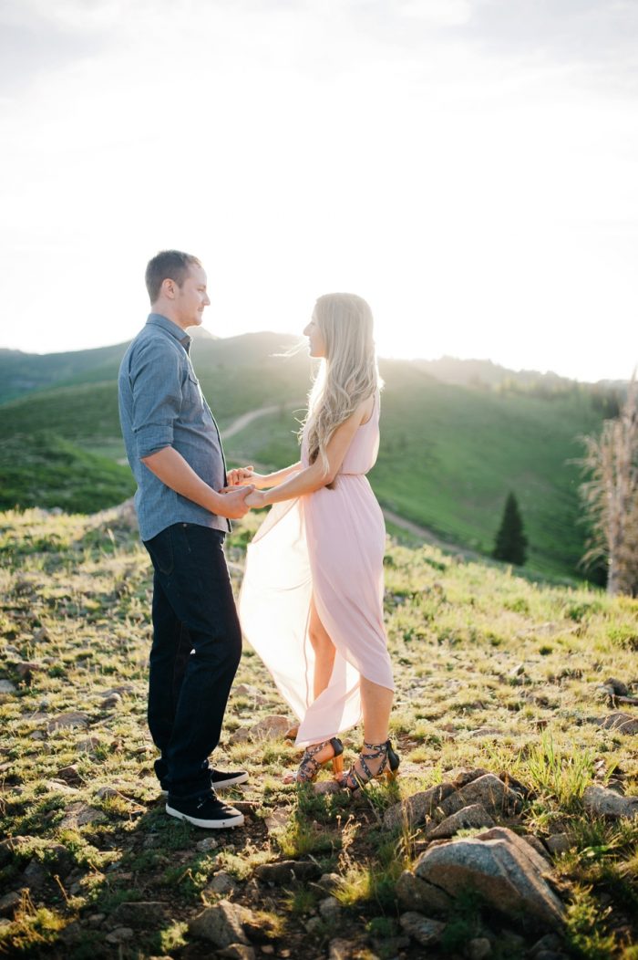Wind-swept Mountaintop Engagement in Utah - Mountainside Bride
